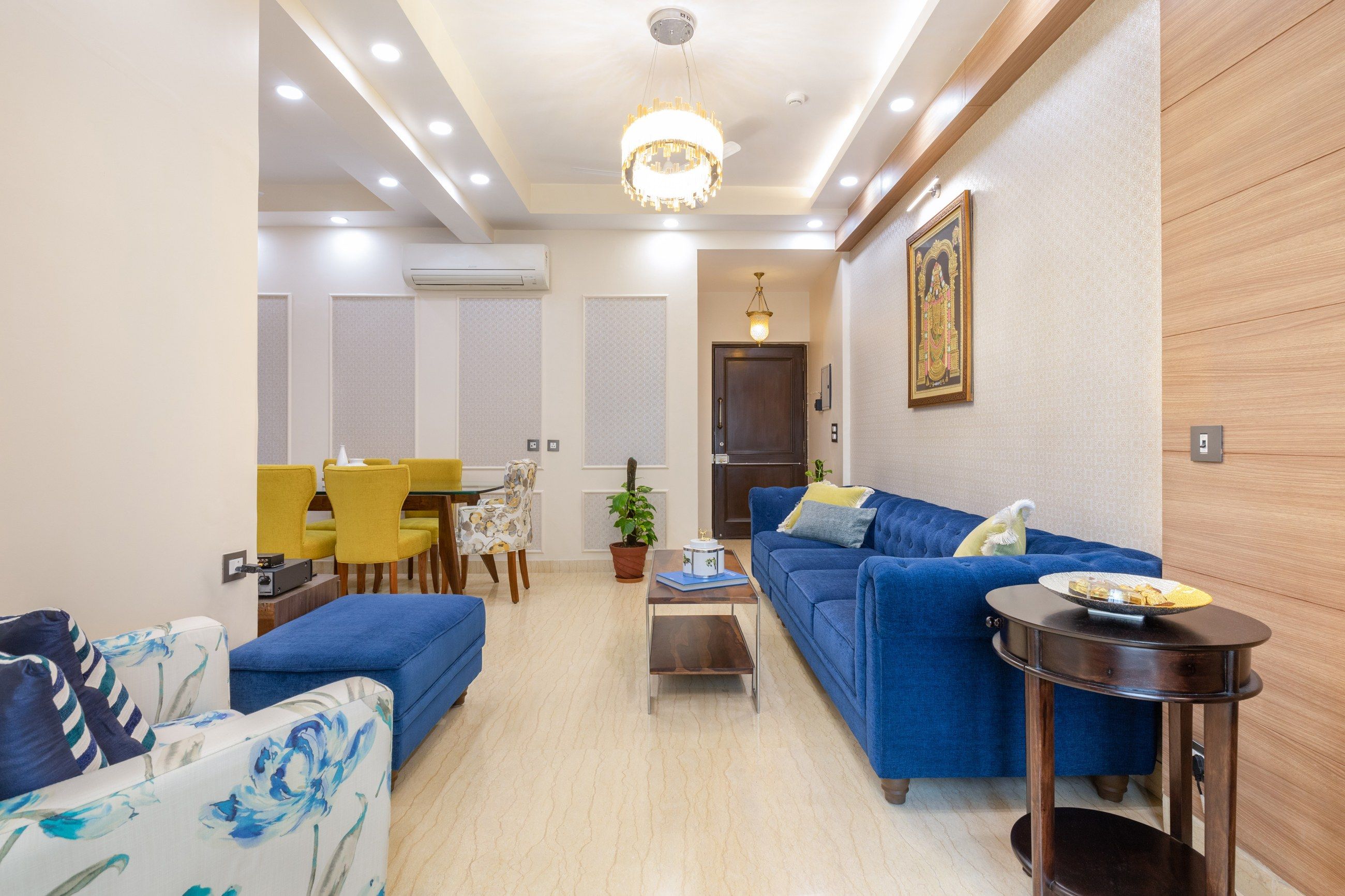 False Ceiling Design With Subtle Colours And Chandelier | Livspace