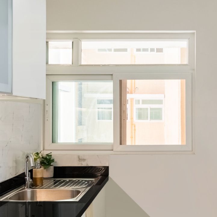 Kitchen Window Design With A White Frame | Livspace