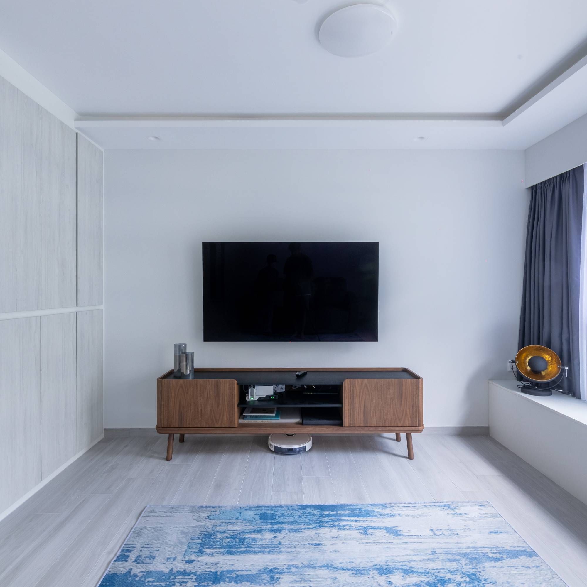 Brown Floor-Mounted TV Unit With A White Back Wall | Livspace Brown Floor-Mounted TV Unit With A White Back Wall | Livspace