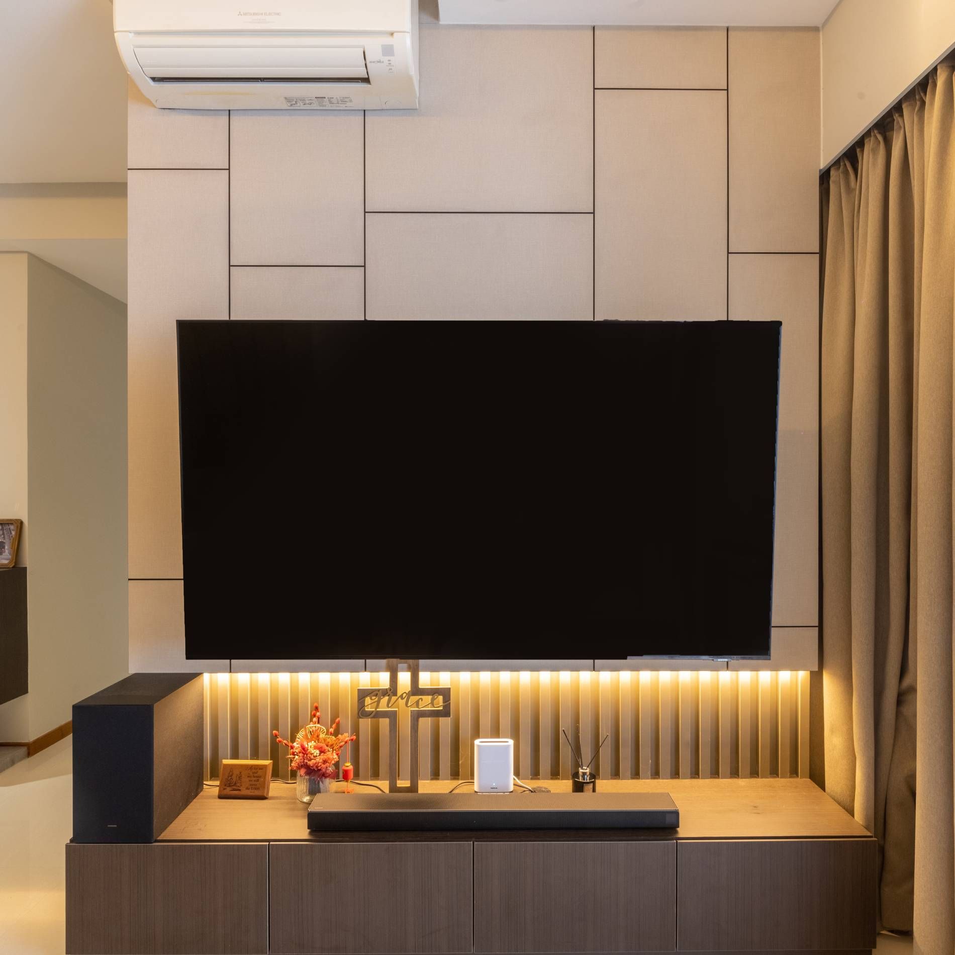 Walnut Brown TV Unit With Warm Cove Lighting | Livspace