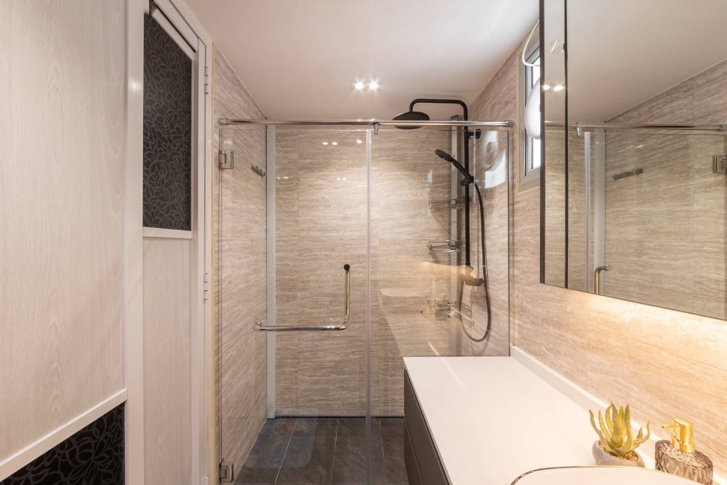 Beige Bathroom Design With Glass Partition | Livspace