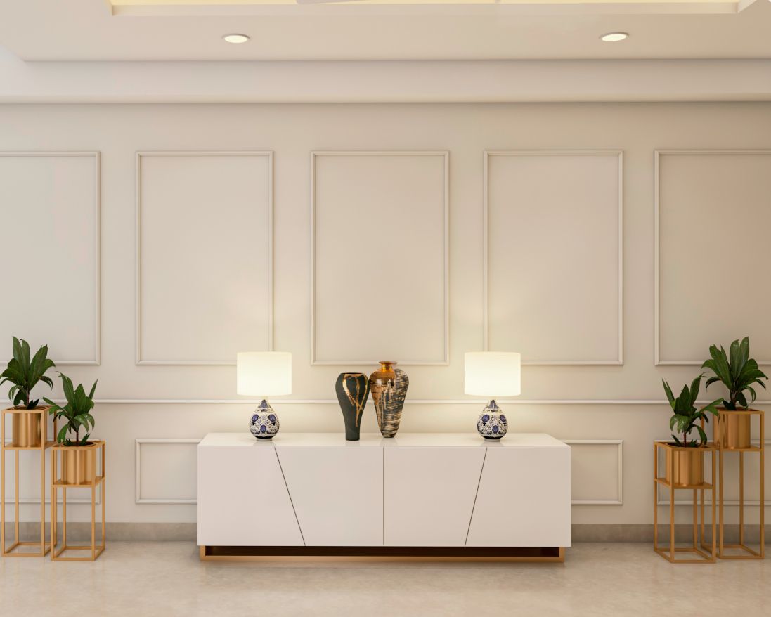 White Foyer Design with Multiple Trims and White Lamps | Livspace