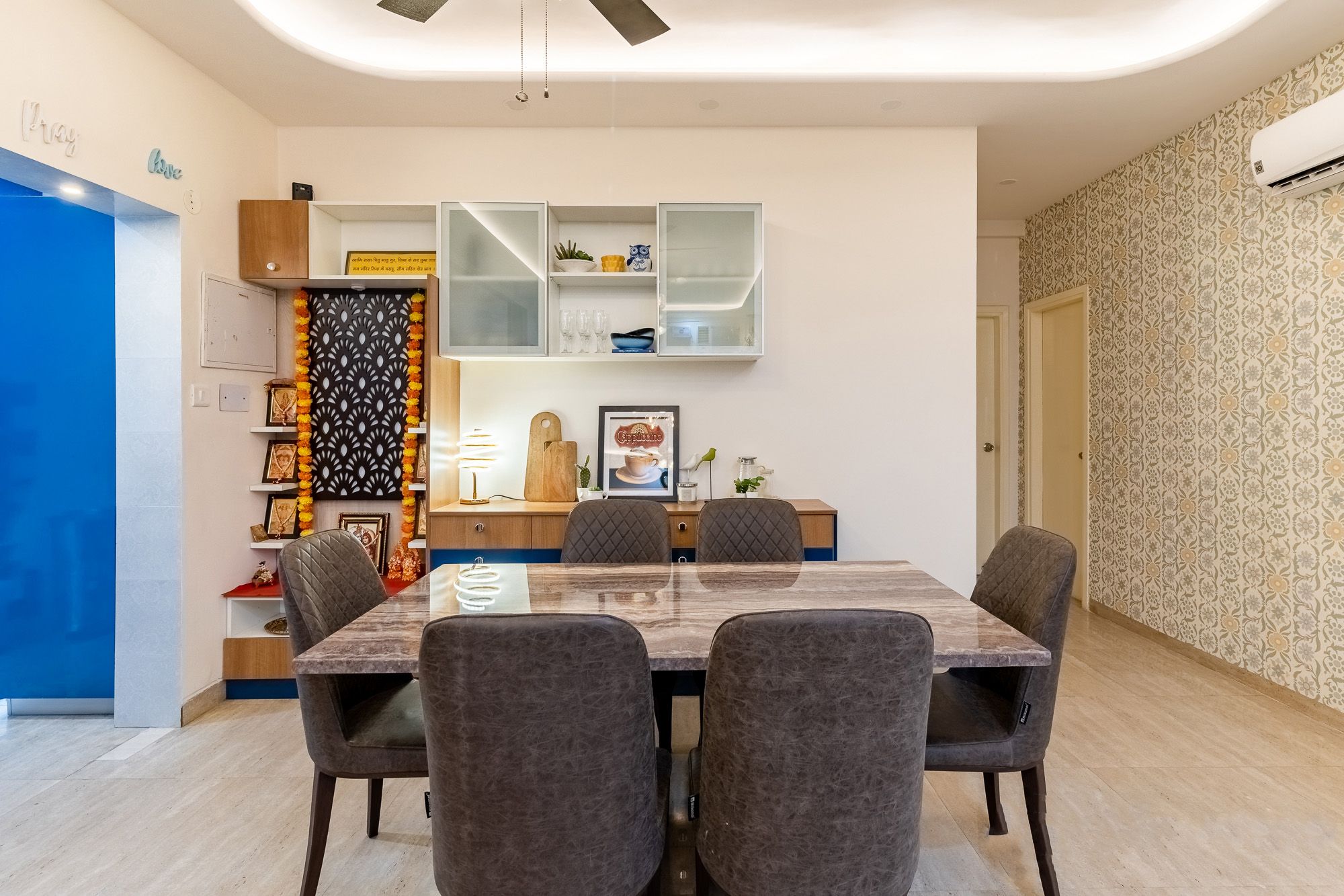 Spacious Dining Room Design With Pooja Unit | Livspace