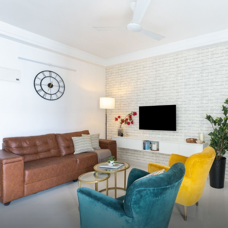 Spacious Living Room Design With A TV Unit And Floor Lamp | Livspace