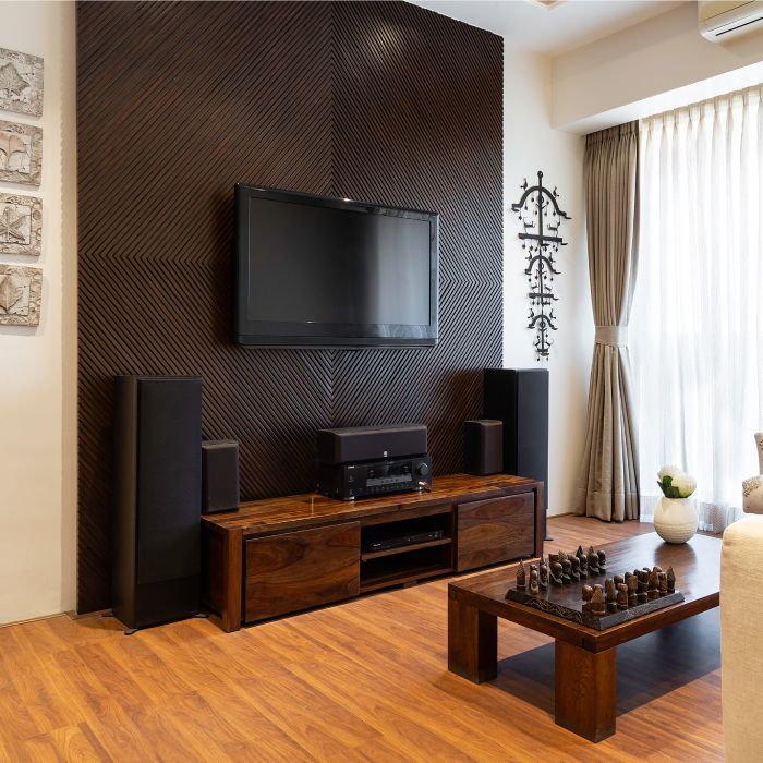 Spacious TV Cabinet Design With Wooden Flooring | Livspace