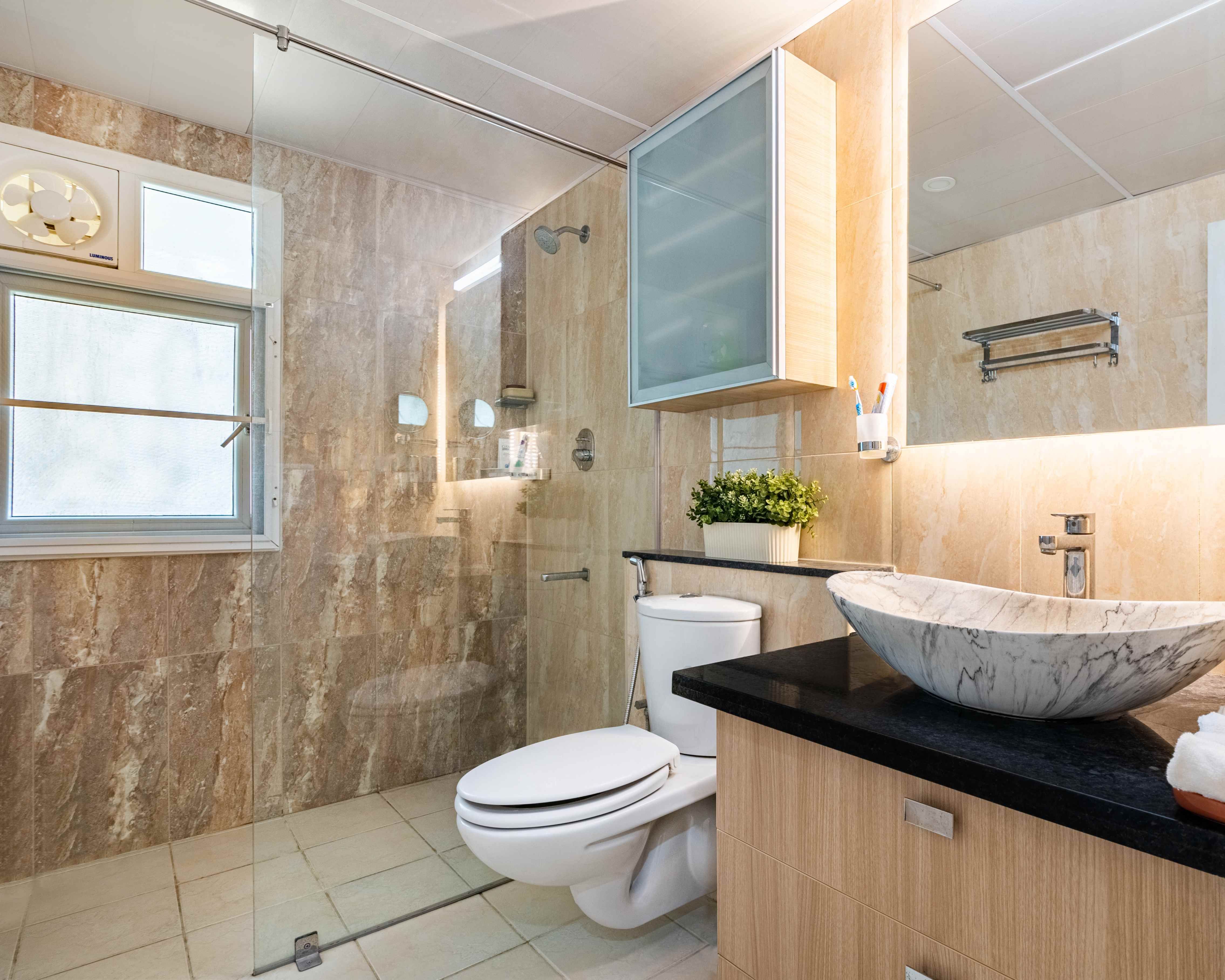 Spacious Washroom Design With A Backlit Mirror | Livspace