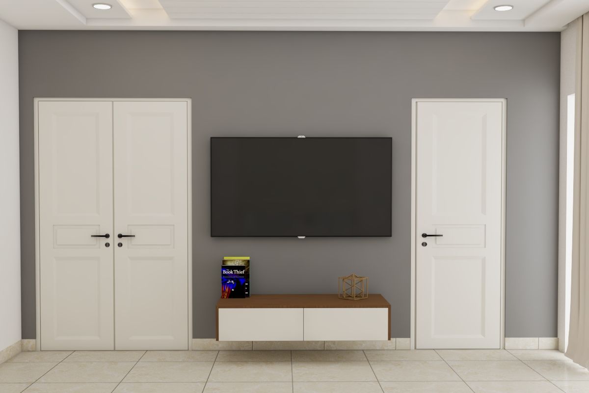 Spacious TV Unit Design With Wall mounted TV And Console | Livspace