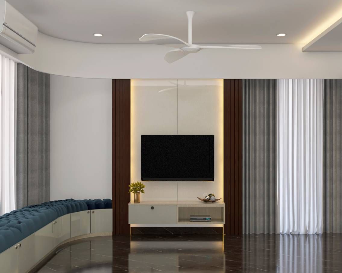 Modern TV Unit With Curved Seating Space | Livspace