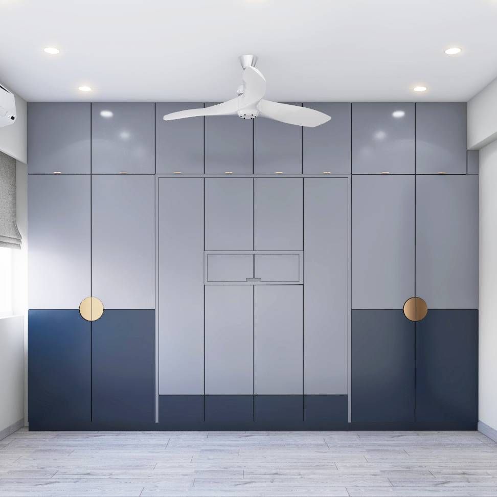 Spacious Grey And Blue Wardrobe Design With Loft Storage | Livspace