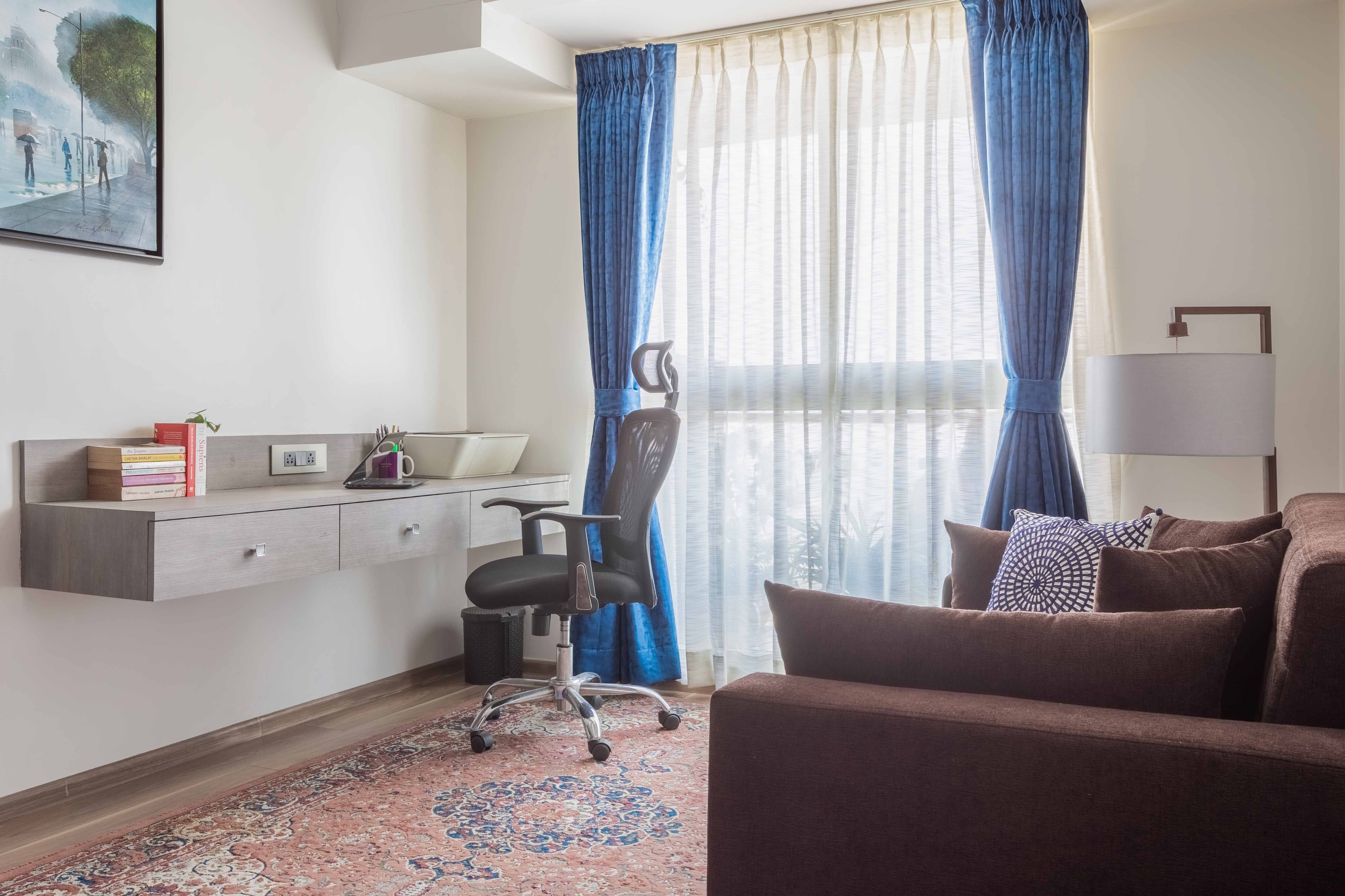 Home Office Design With Dark Wood Wall-Mounted Study Table | Livspace