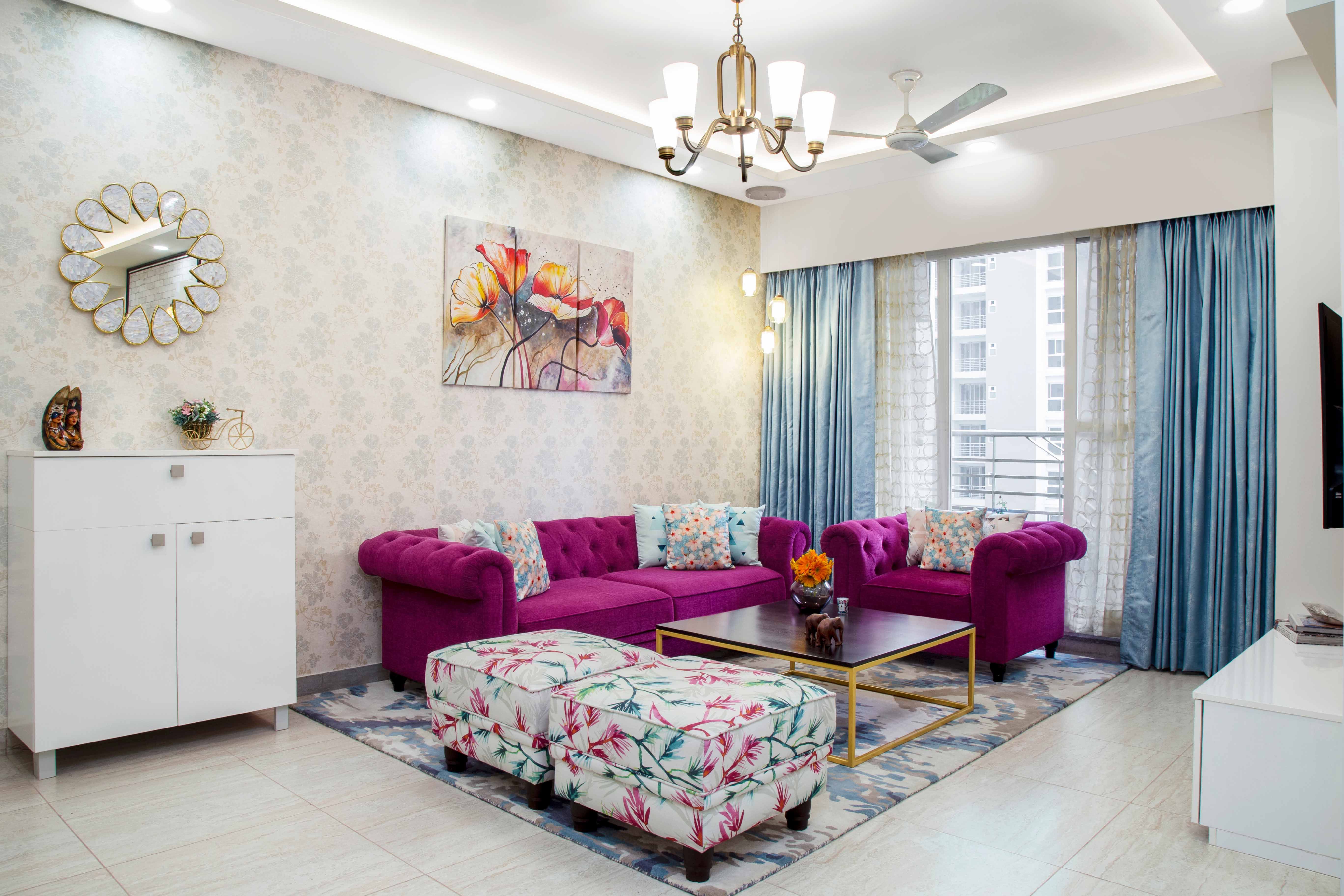 2-BHK Flat Design In Noida With L Shaped Magenta Sofa Set And Accent Seaters | Livspace
