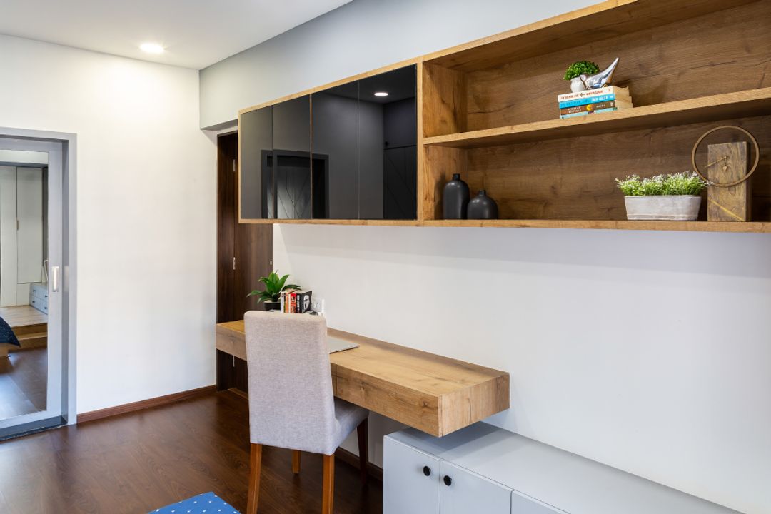 Spacious Home Office Design With A Wall-Mounted Wooden Table | Livspace