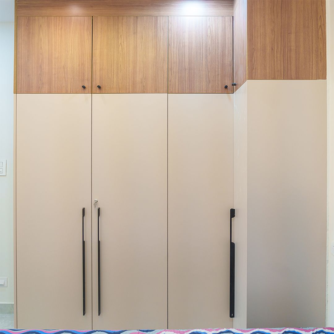 4-Door Contemporary Wardrobe Design With Vertical Storage | Livspace