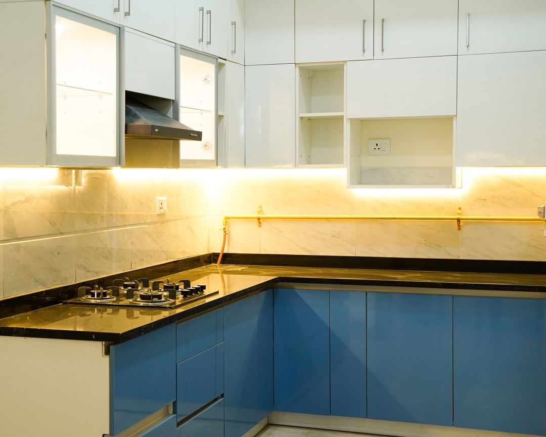 L-Shaped Modern Kitchen Design with Shore Blue Cabinets and Open Shelving | | Livspace