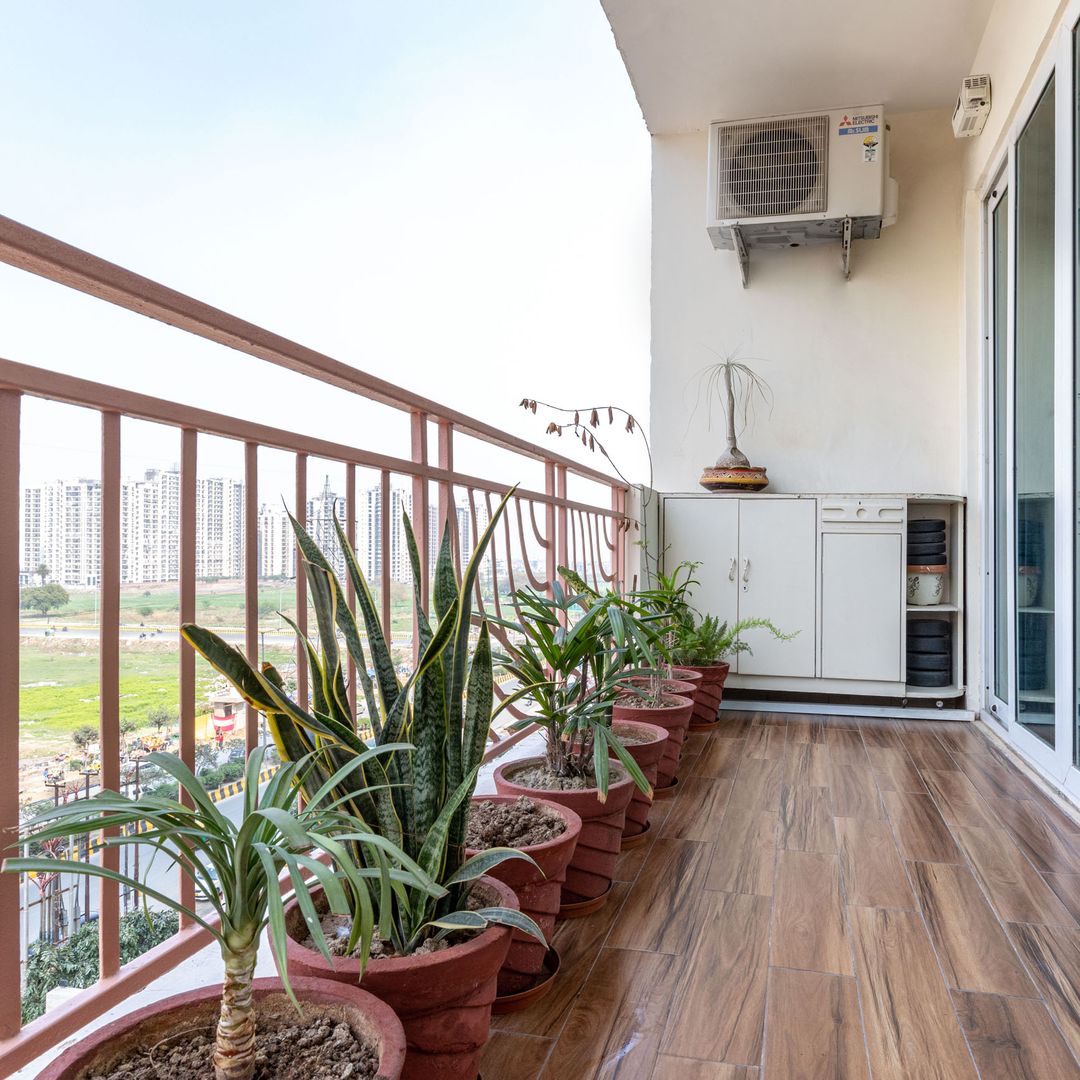 Compact Balcony Design With Wooden Flooring - 4X8 Feet | Livspace