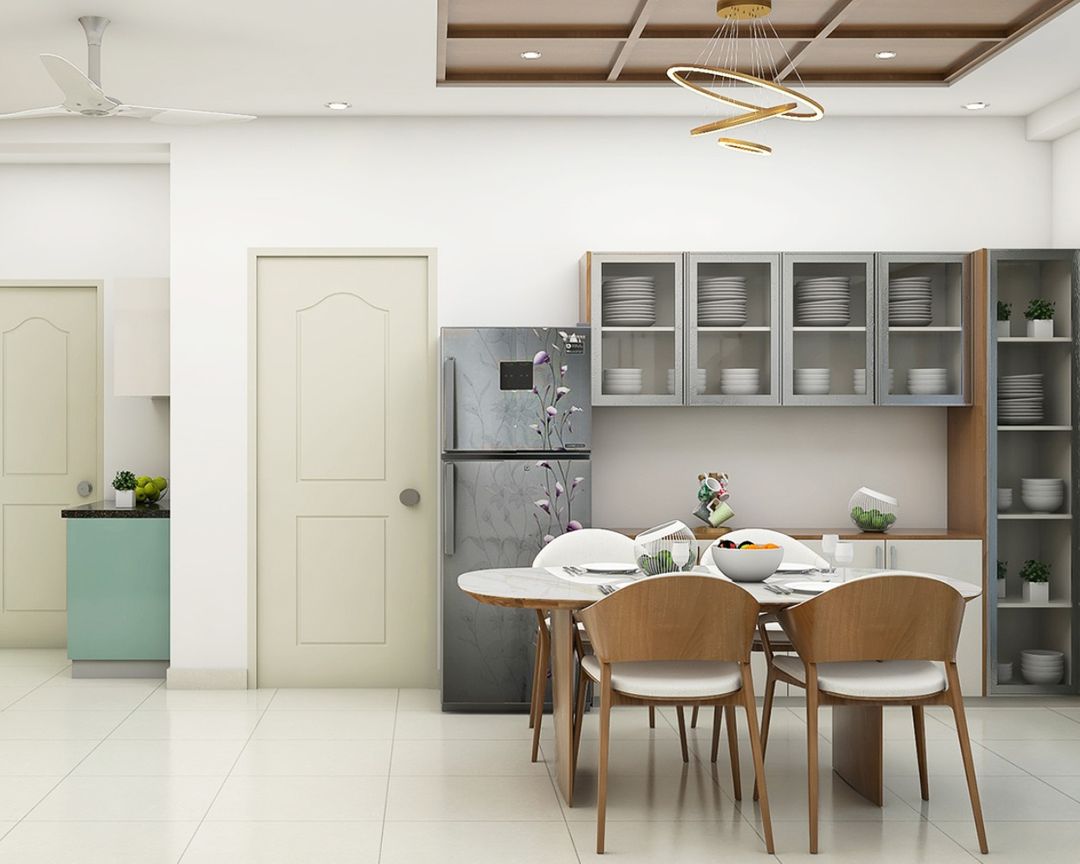 Compact Dining Room With A Crockery Unit With Glass Shutters | Livspace