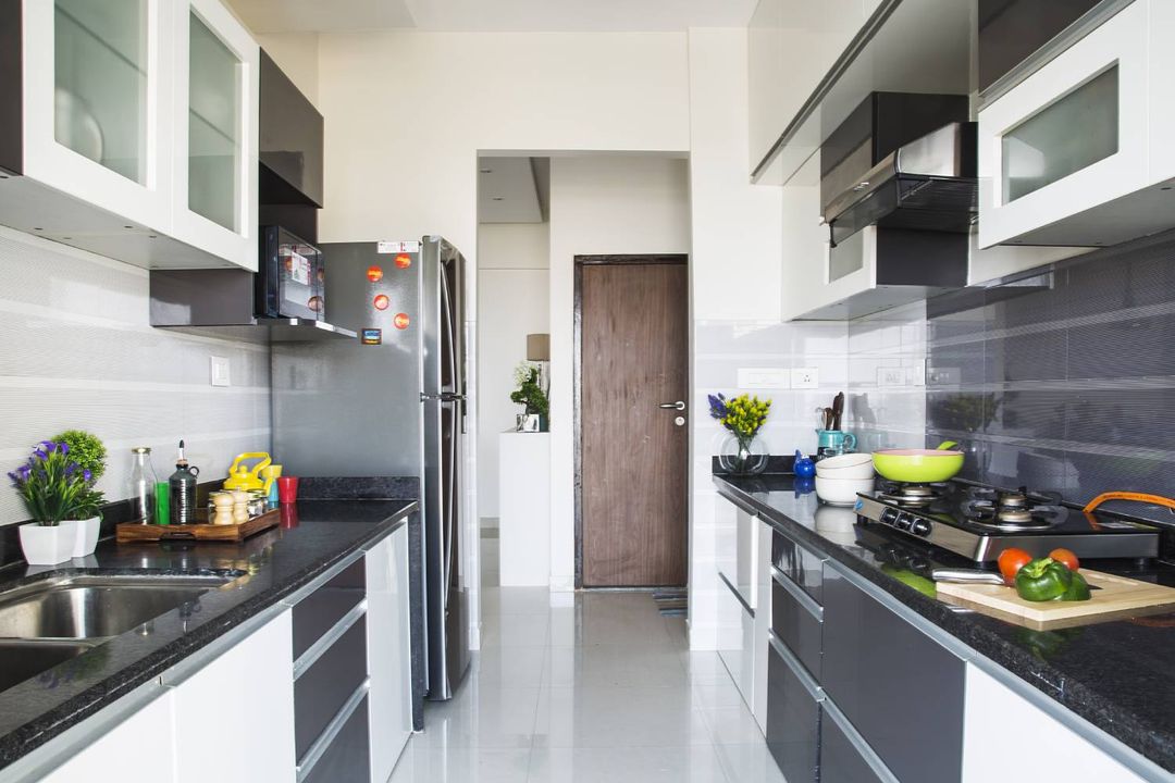 2BHK Mumbai Flat Design with Contemporary Accents and Parallel Kitchen ...