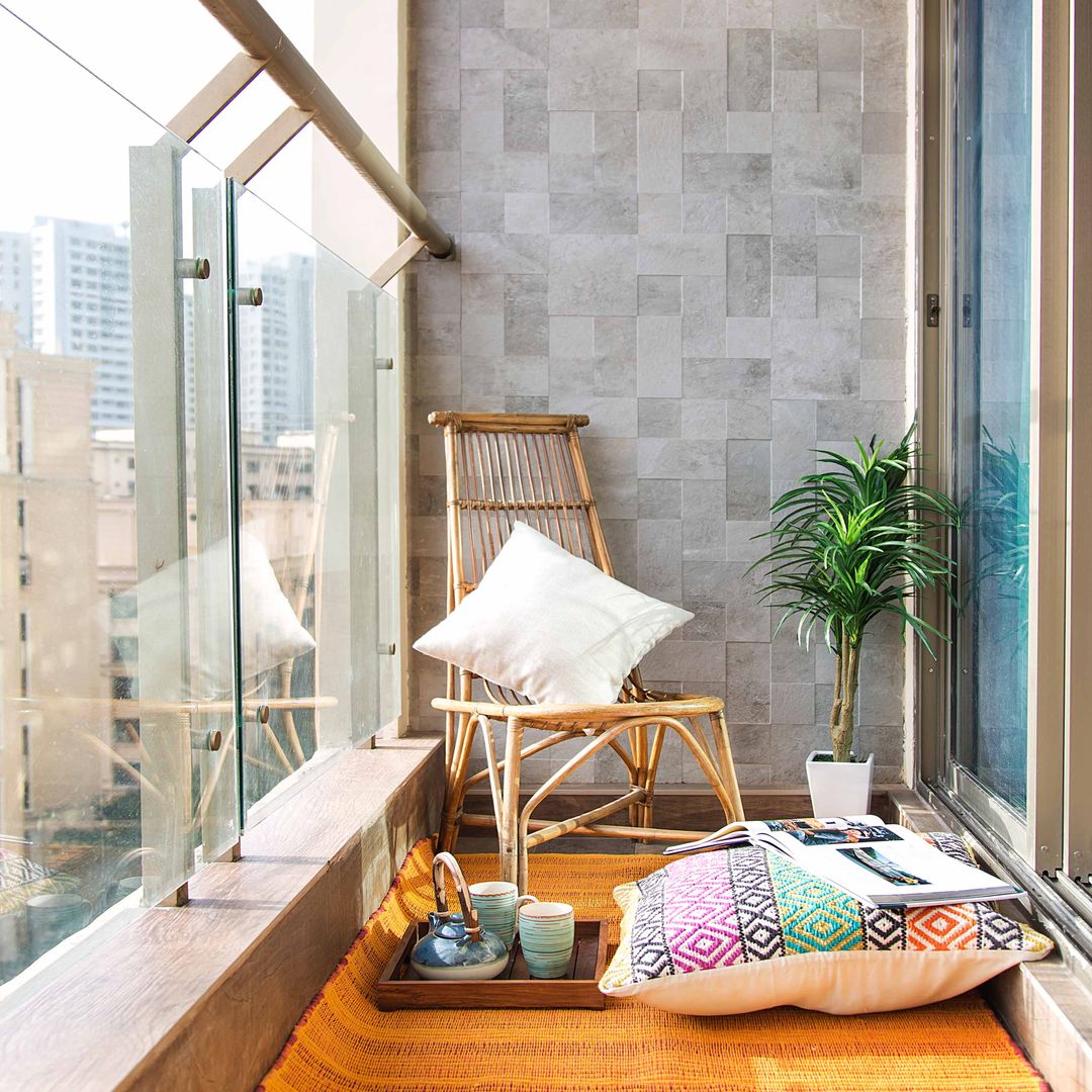 Modern Contemporary Balcony Design with Grey Stone Cladding Wall and Wooden Flooring | Livspace