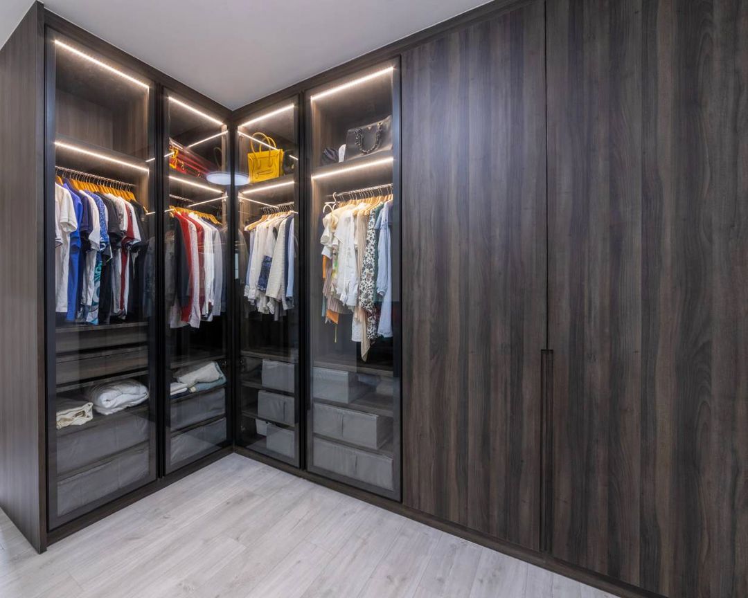 L-Shaped Contemporary Cherry Walnut Walk-in Wardrobe Design | Livspace