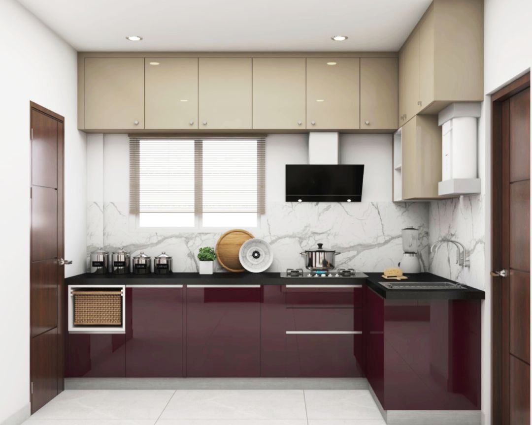 Spacious Wine Red And Irish Cream L-Shaped Kitchen Design With Black Countertop | Livspace