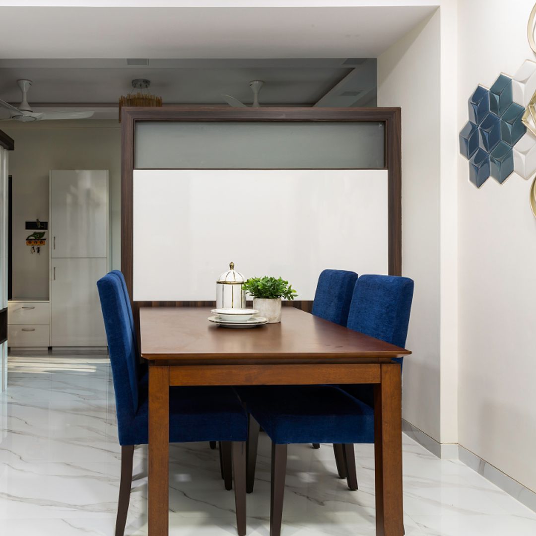 Spacious Dining Hall Design With Wall Art | Livspace
