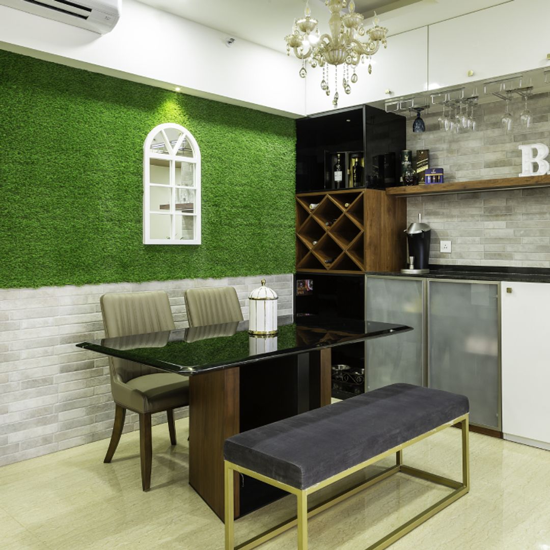 Spacious Dining Room With Artifical Grass For The Walls | Livspace