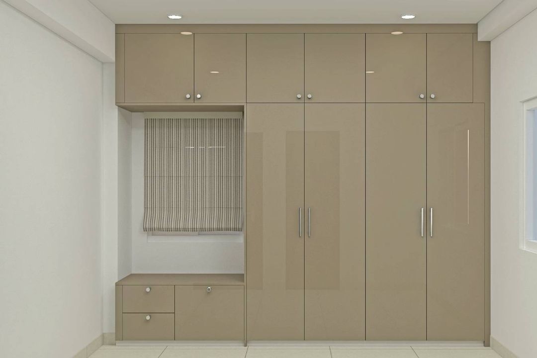 Metallic Beige Swing Wardrobe Design With Loft Storage | Livspace