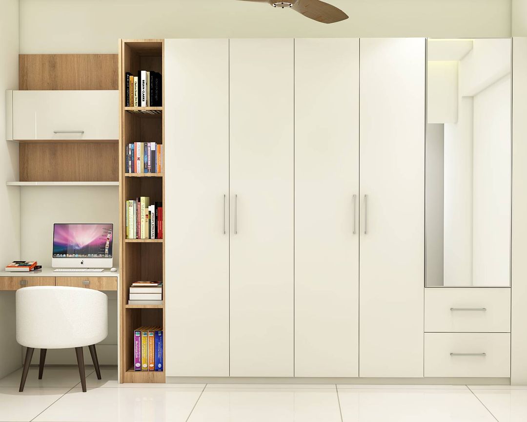 Spacious Off-White Wardrobe Design With Study Table | Livspace