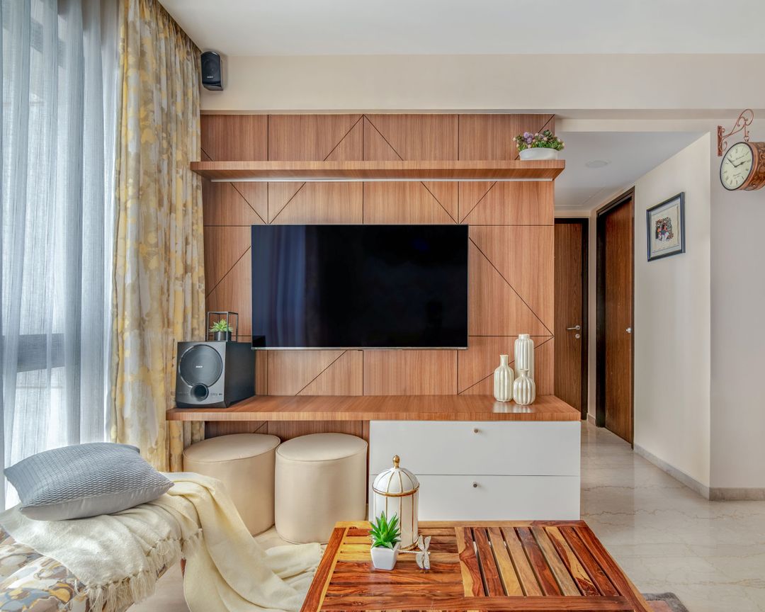 White And Walnut Bronze TV Unit Design With Wooden Panelling | Livspace