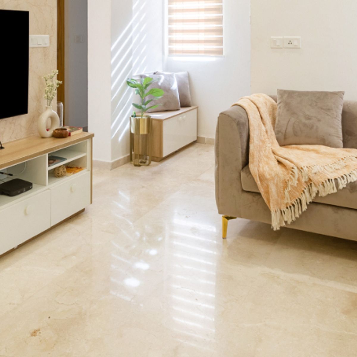 Living Room Flooring Design With Cream-Coloured Tiles | Livspace