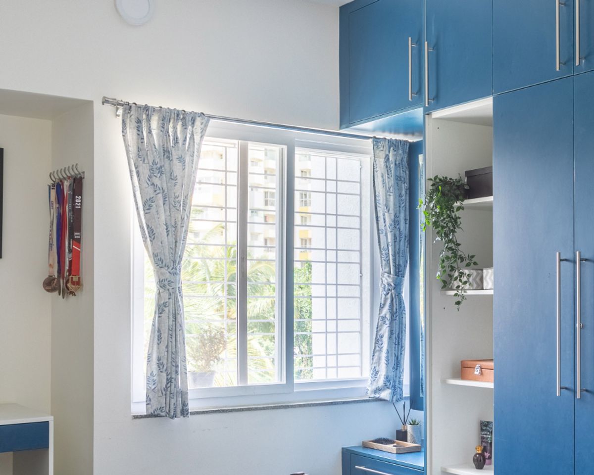 Modern Bedroom Window Design With Floral Curtains | Livspace