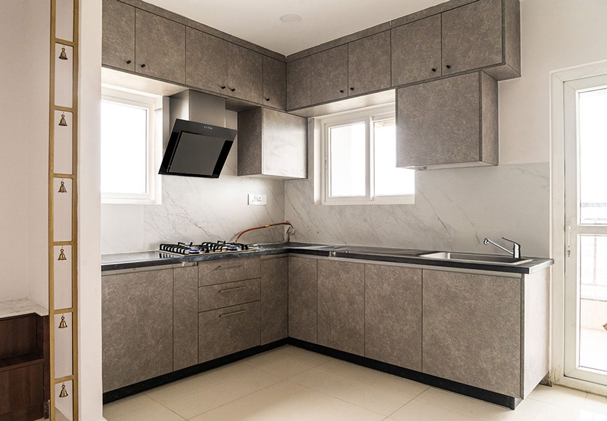 Modern L-Shaped Kitchen Design With Stone-Textured Cabinets and Granite ...