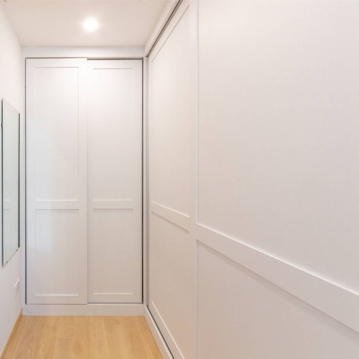 Sliding Wardrobe Design With A Laminate Finish | Livspace