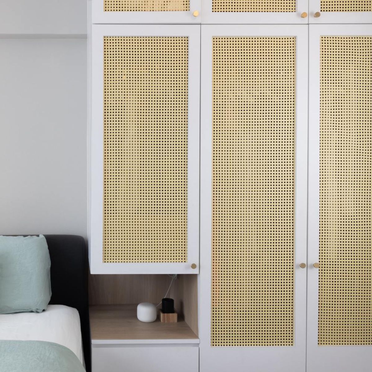 Compact Wardrobe Design With Rattan Shutters | Livspace