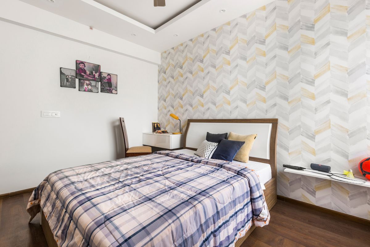 Compact Guest Room Design With Geometric Wallpaper - 10x8 Ft | Livspace