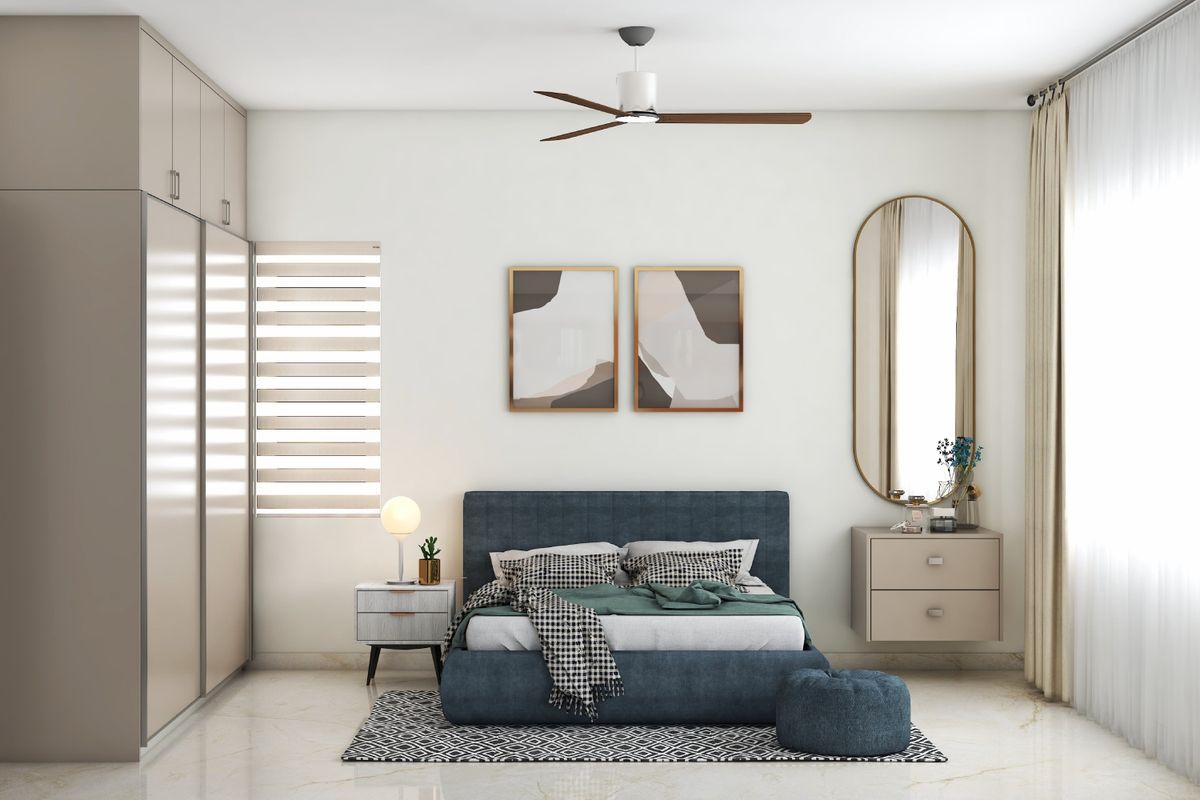 Modern Retreat: Modern Master Bedroom Design With Blue Bed & Oval Mirror | Livspace