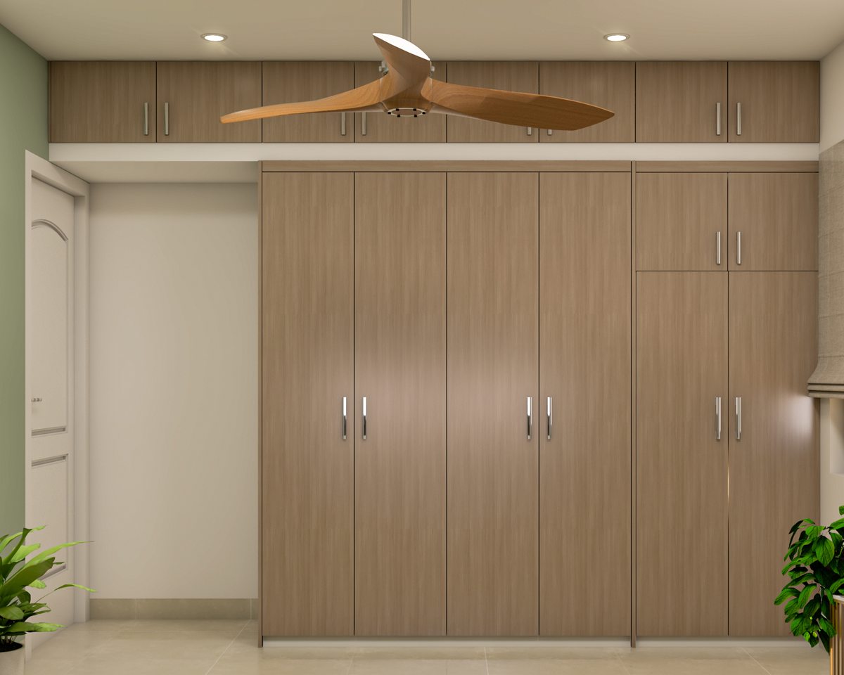 Traditional Spacious Full-Length Wardrobes with Lofts | Livspace