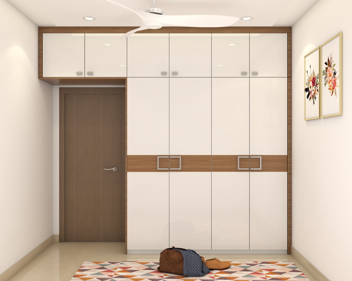 Straight Hinged Modern Wardrobe Design Idea with Loft Storage | Livspace