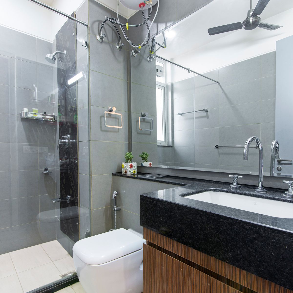 Compact Bathroom Design With A Shower Unit | Livspace