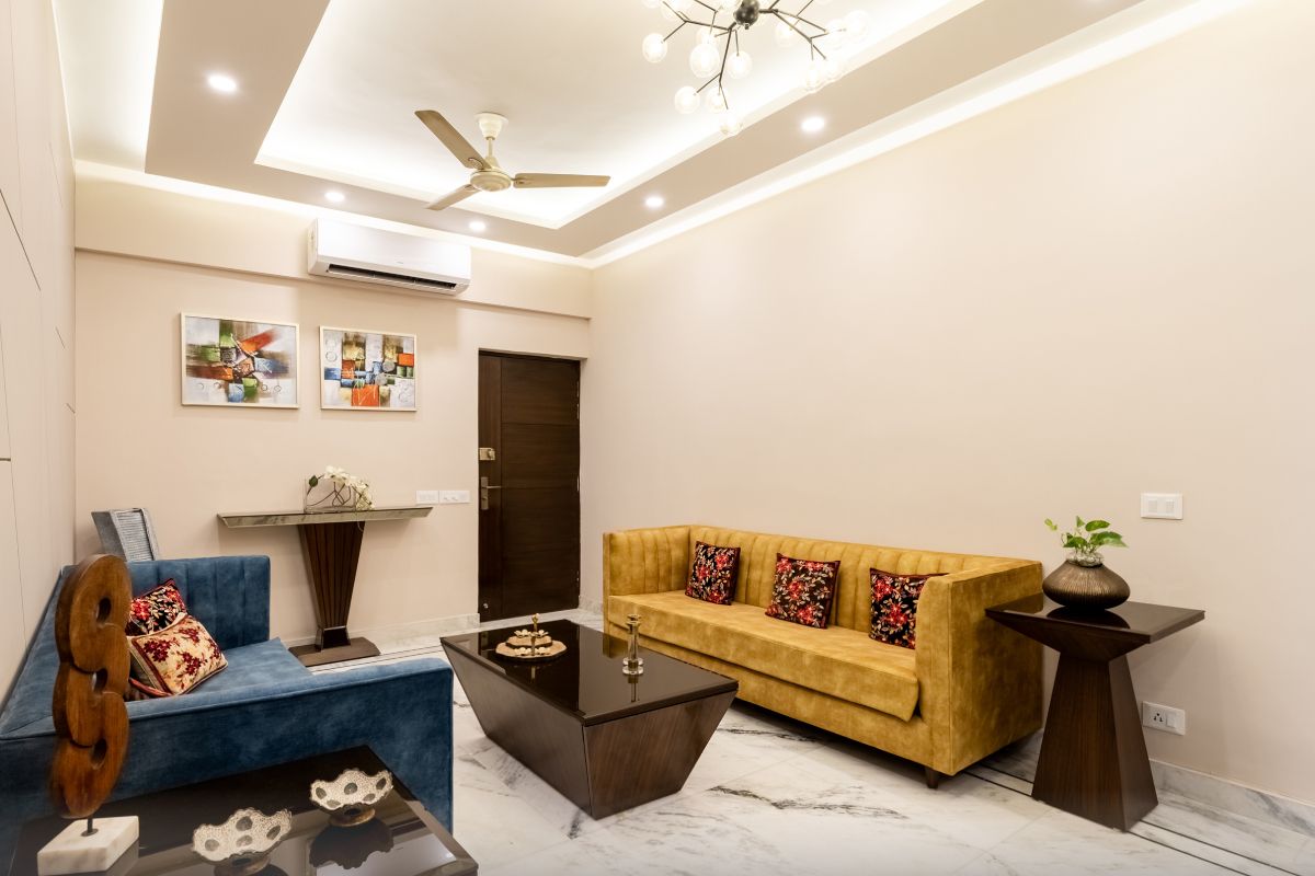 Compact Drawing Room Design With Contrasting Colours | Livspace