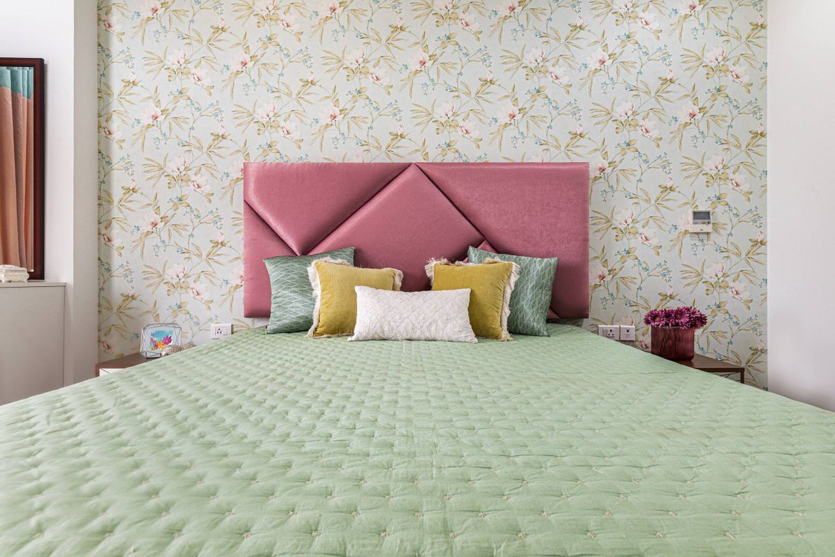 Spacious Bedroom Design With Floral Wallpaper | Livspace