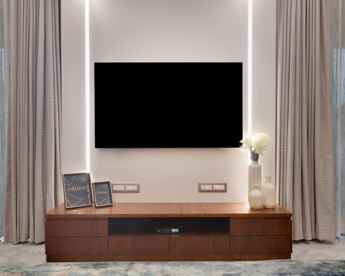 Spacious TV Unit Design With Floor-Mounted Drawer | Livspace