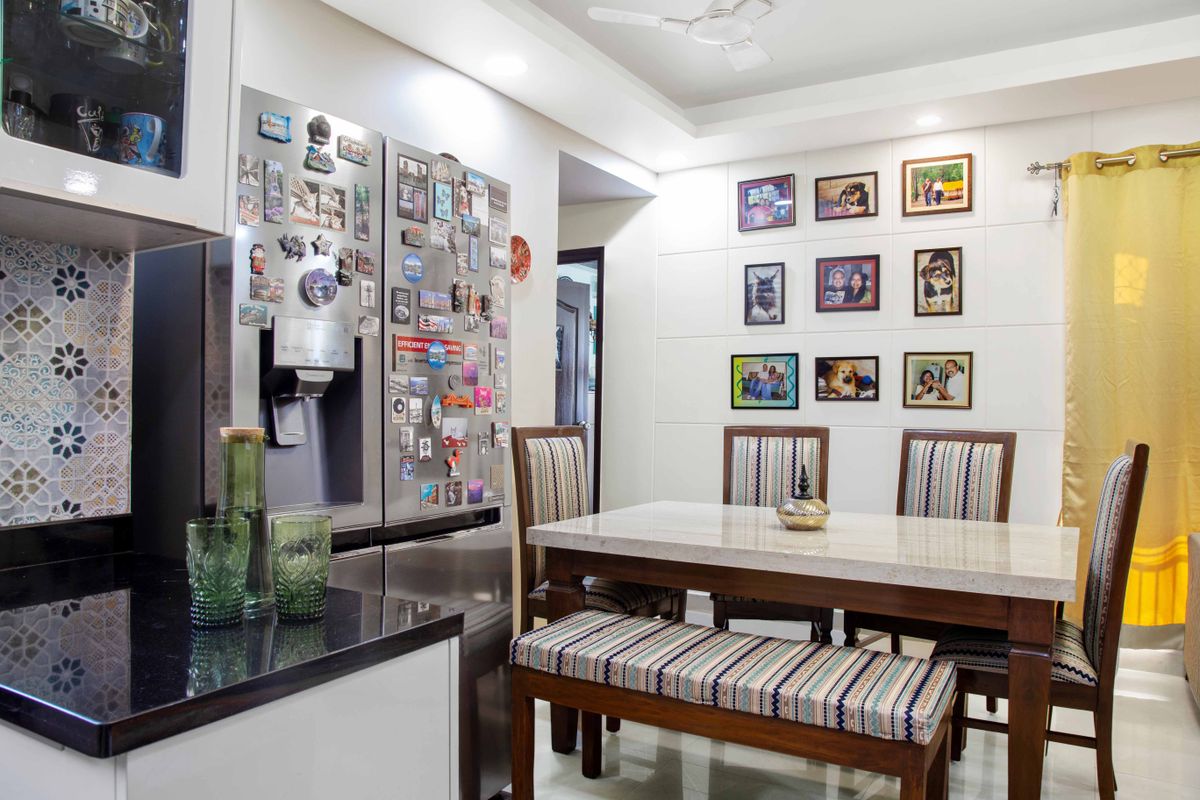 Noida 2-BHK Apartment Interior Design With L Shaped Grey And White ...