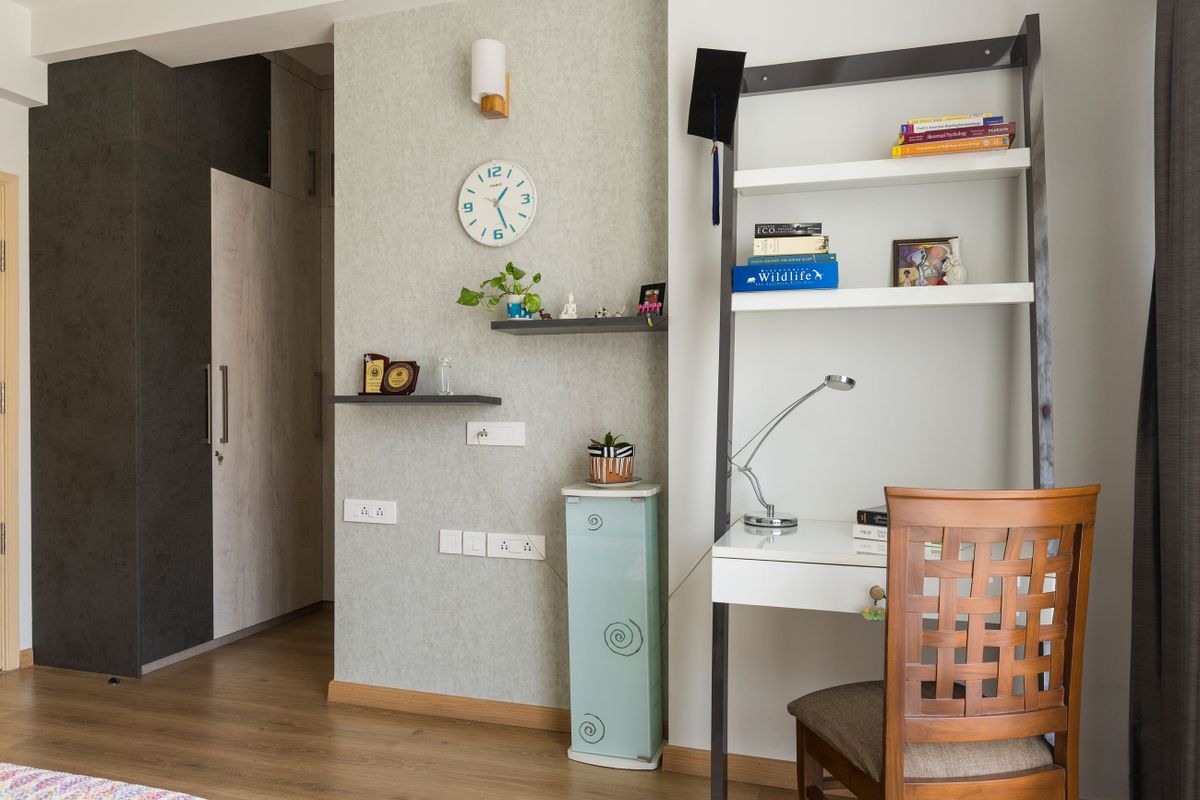 Gurgaon 2-BHK Flat Design With Yellow And White Patterned Living Room ...