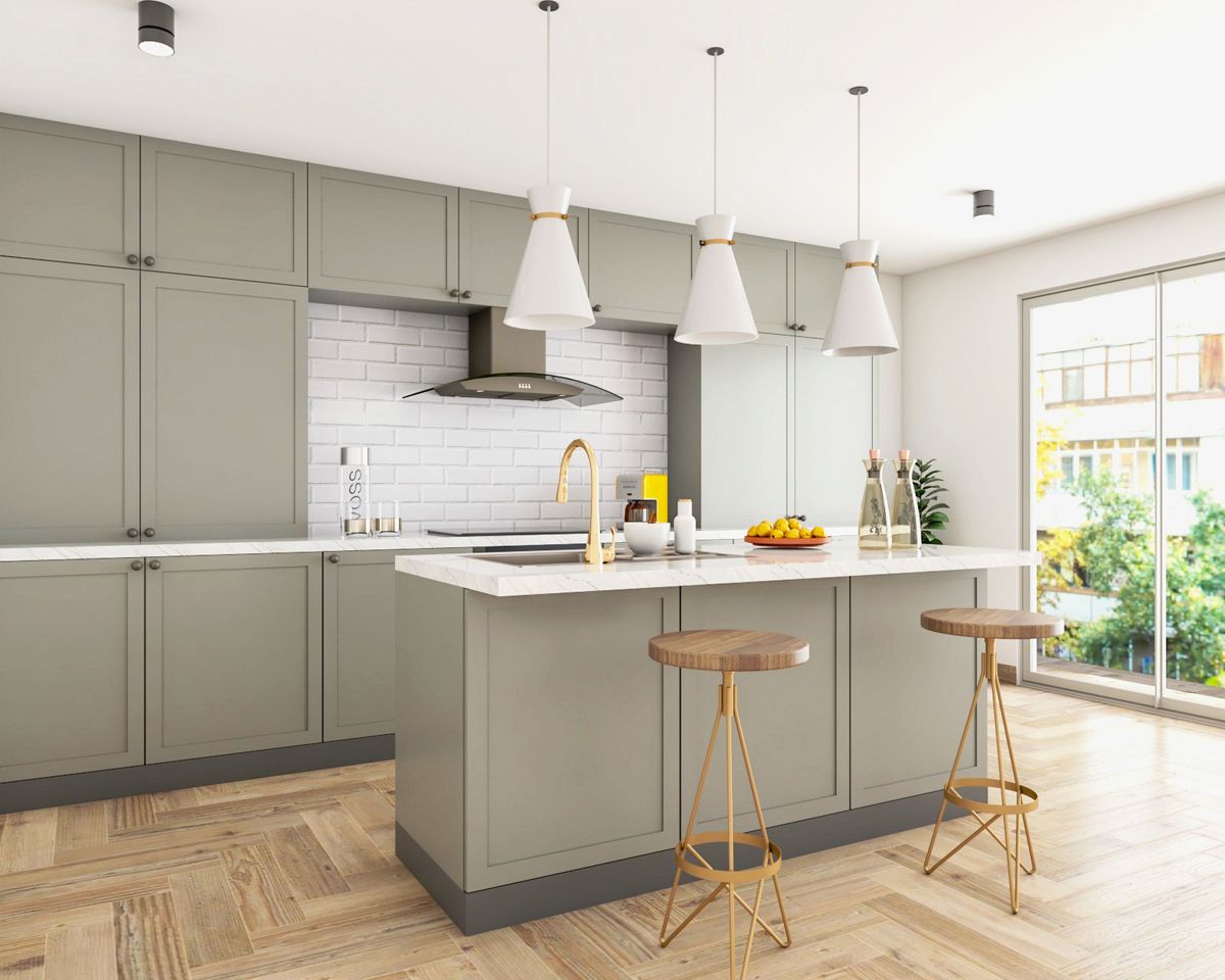 Modern River Stone Island Kitchen Design with Quartz Countertops | Livspace