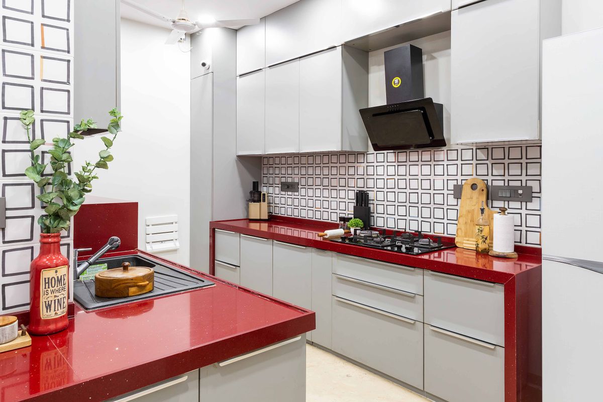 3-BHK Flat In Mumbai With Red And White Modular Kitchen | Livspace