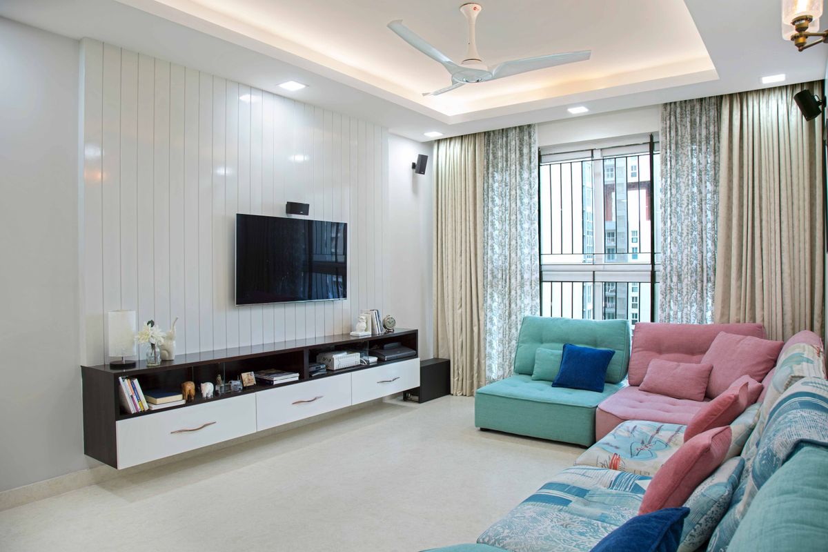 Small 1 BHK Flat Interior Design In Bangalore With Mint Green And Baby Pink Sectional Sofa ...
