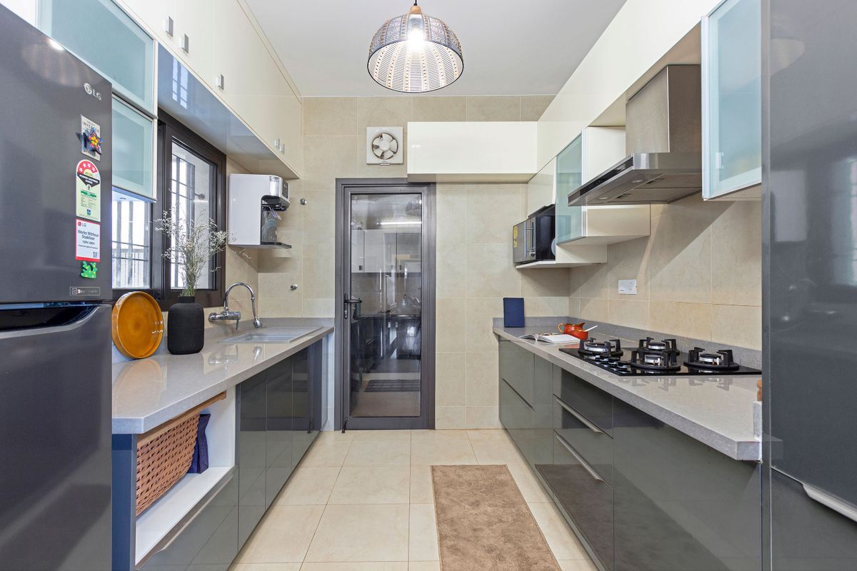 Parallel Modular Kitchen Design In River Stone And Champagne-Tones ...