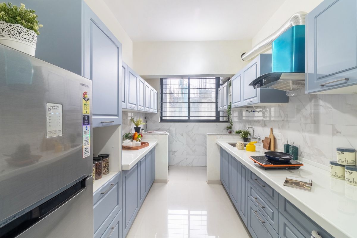 Blue Parallel Kitchen Design With Denim Suedette Cabinets | Livspace