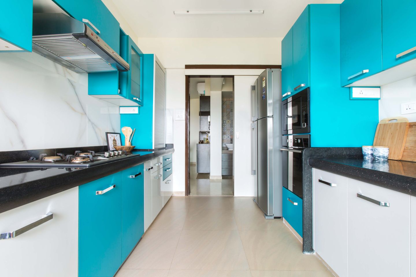 Blue And Frosty White Parallel Kitchen Design With Marble Backsplash ...
